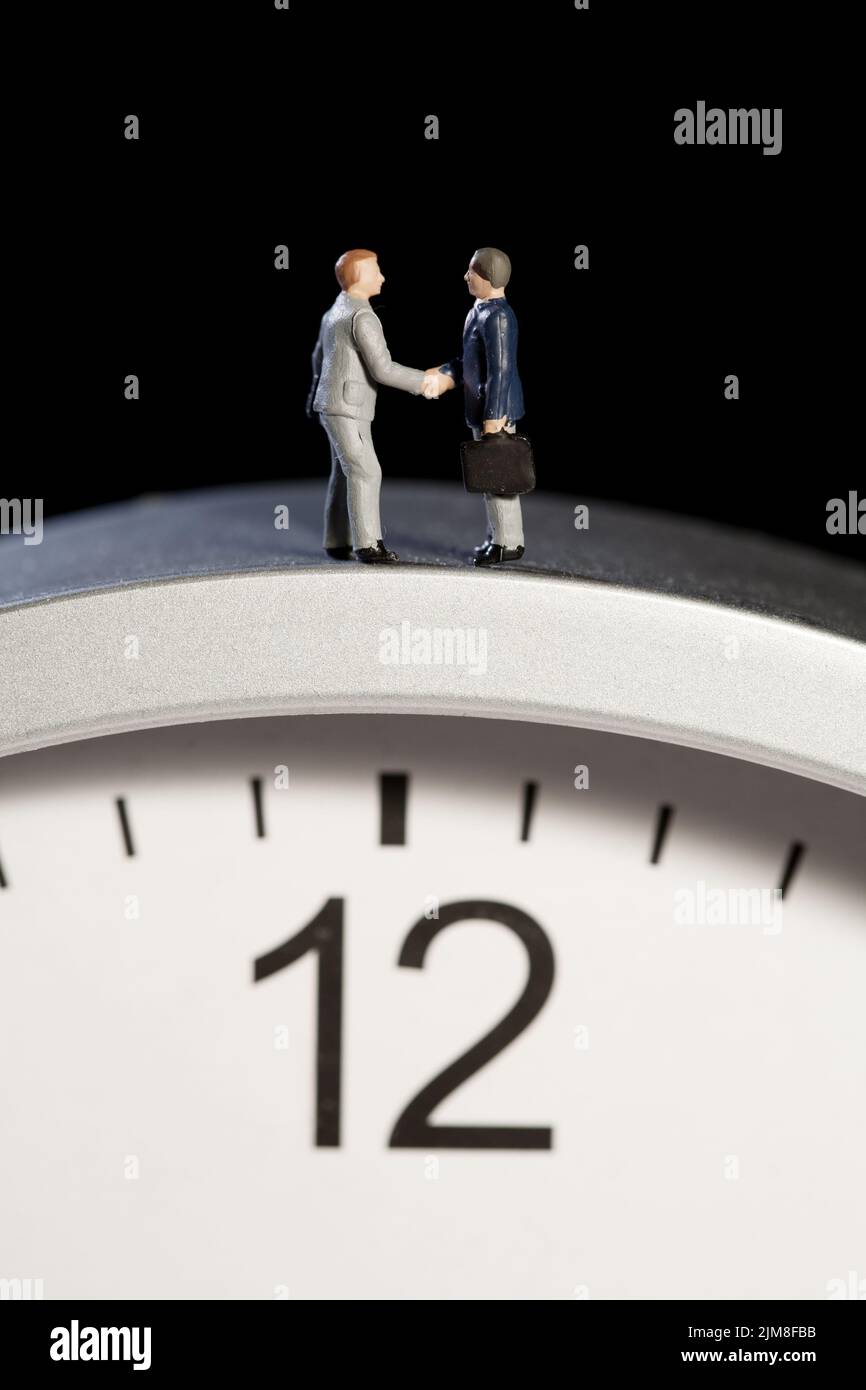 Business deal under time pressure Stock Photo - Alamy