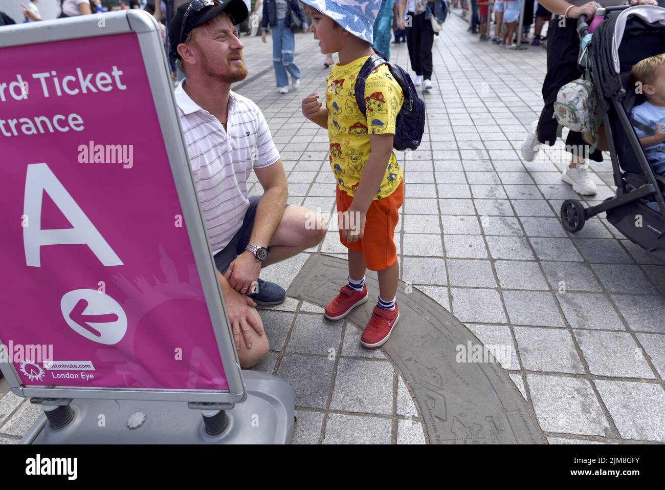 London, England, UK. Father talking his young son on the South Bank [no ...