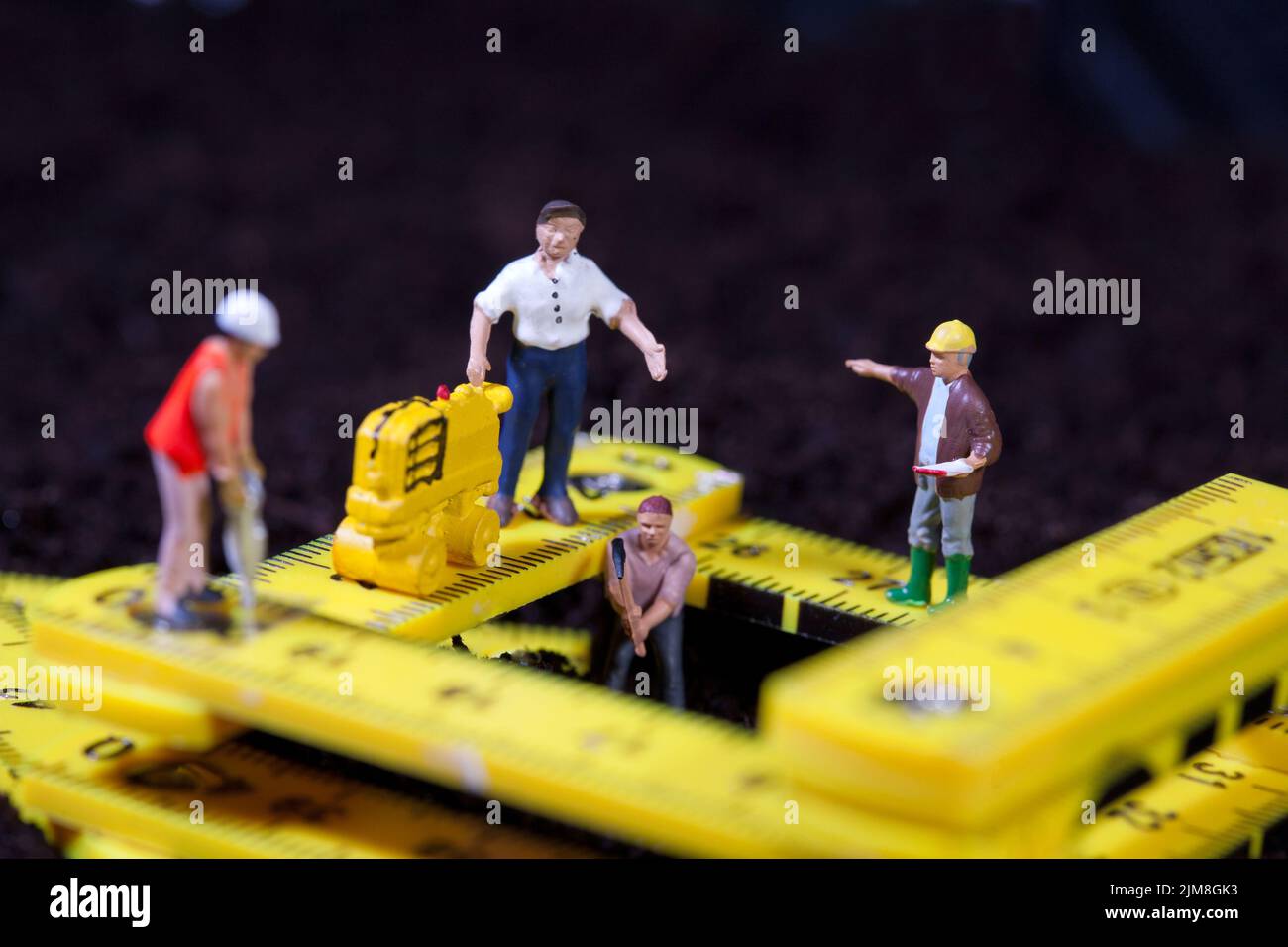 Maintenance team repairs a road Stock Photo - Alamy