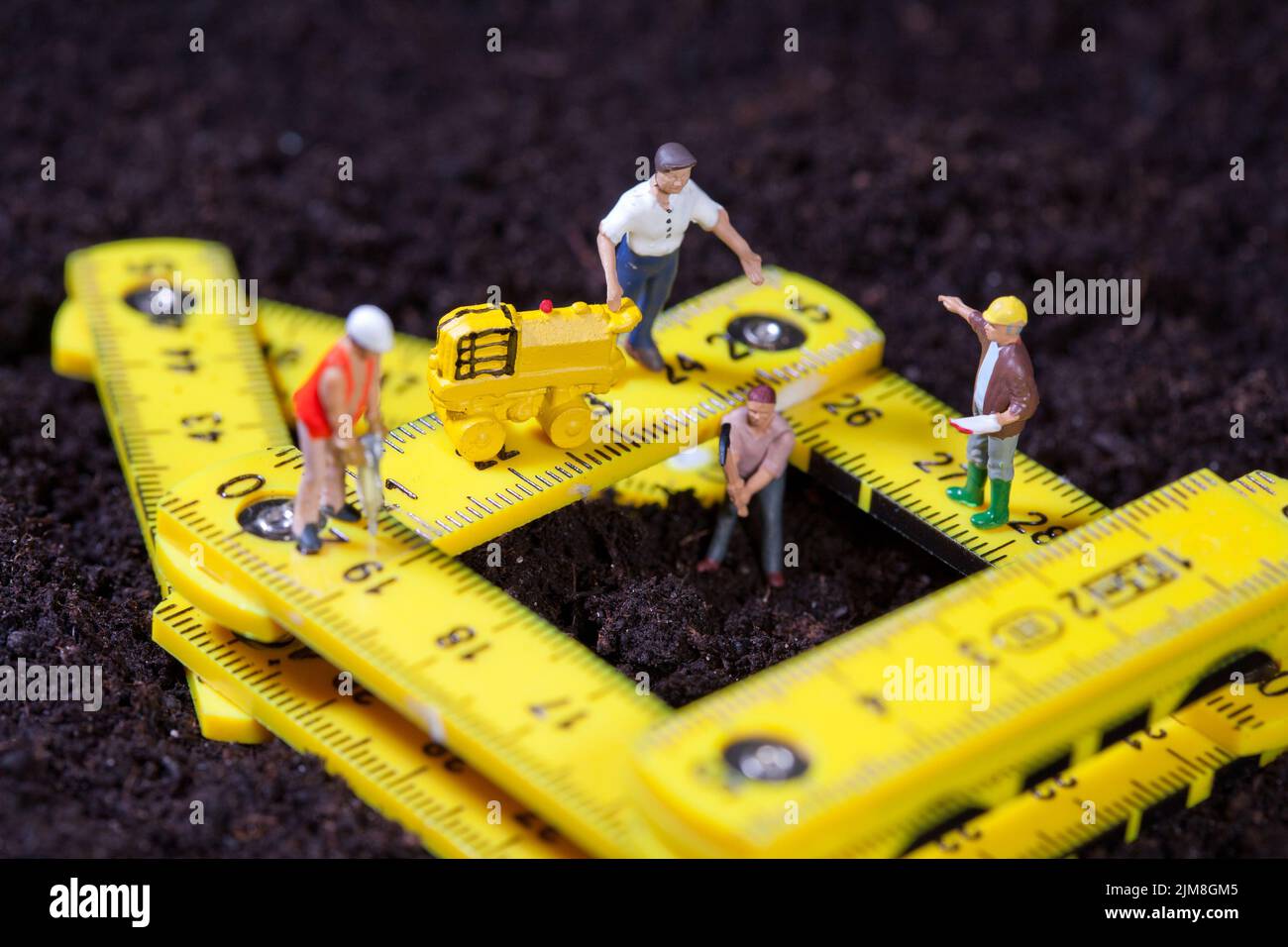 Maintenance team repairs a road Stock Photo - Alamy