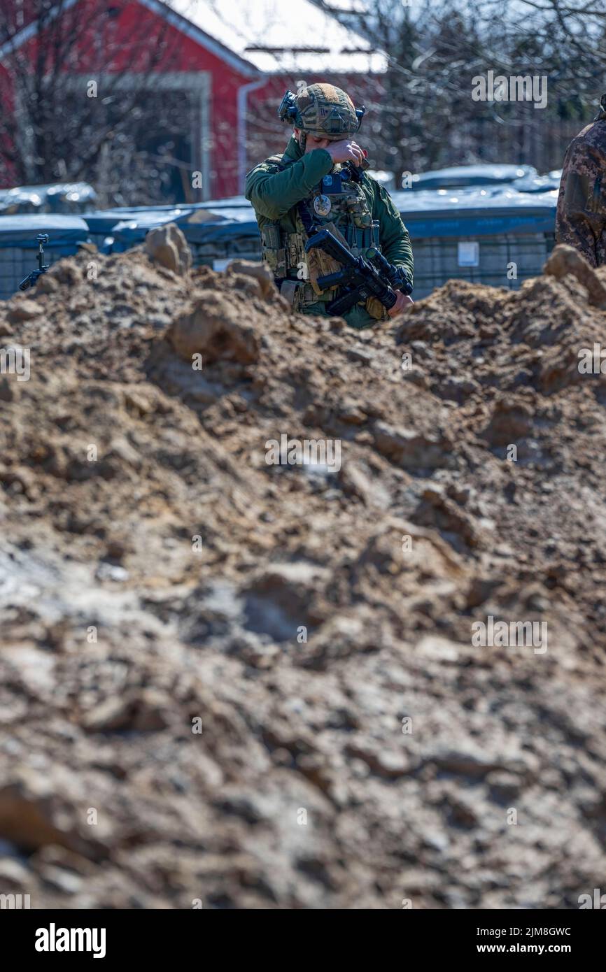 Pic Shows the grave of villagers killed during the invasion and ...