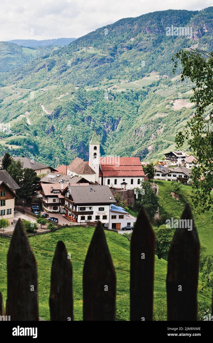 Village behind Fence Stock Photo - Alamy