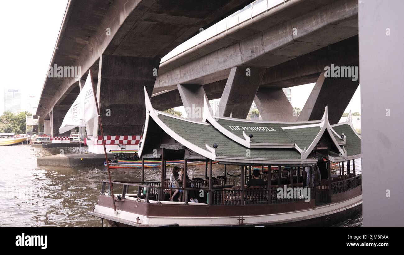 Boat going under the Bridge The Chao Phraya River Bangkok Thailand ...