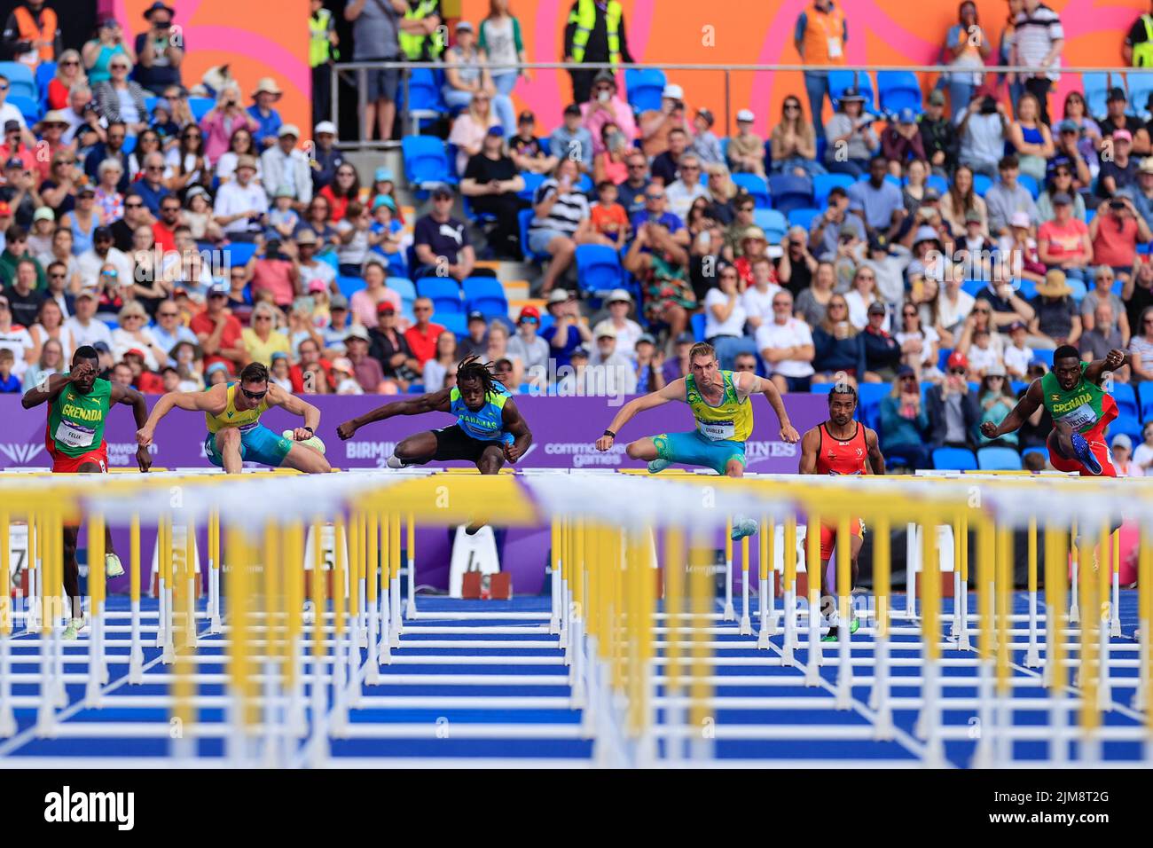 Cedric Dubler of Australia leads the field in the Decathlon 100m ...