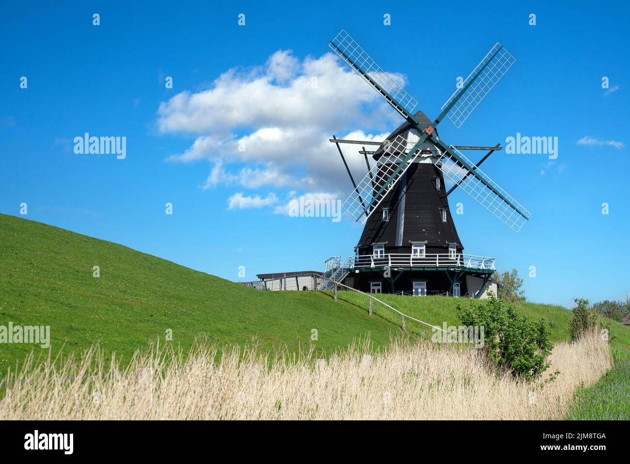 Panoramic image of the windmill of Pellworm against blue sky, North ...