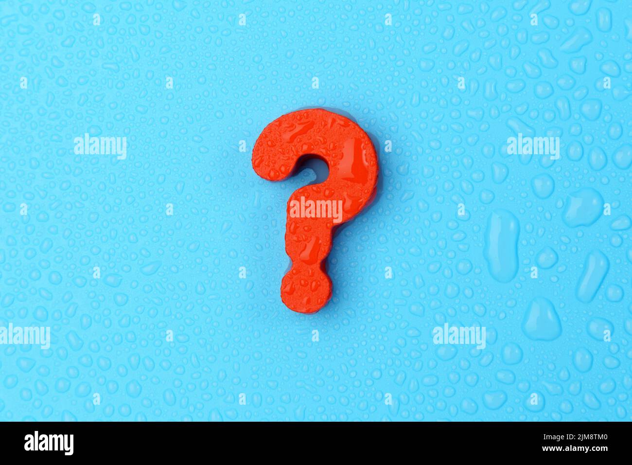 Big red question mark on a blue background. Copy the space, top view ...