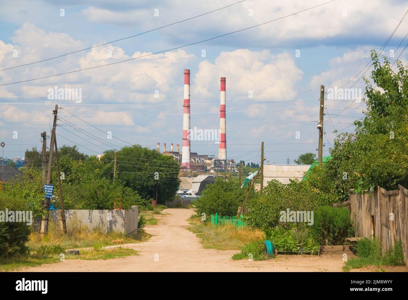 Rural landscape with a view on factory Stock Photo - Alamy