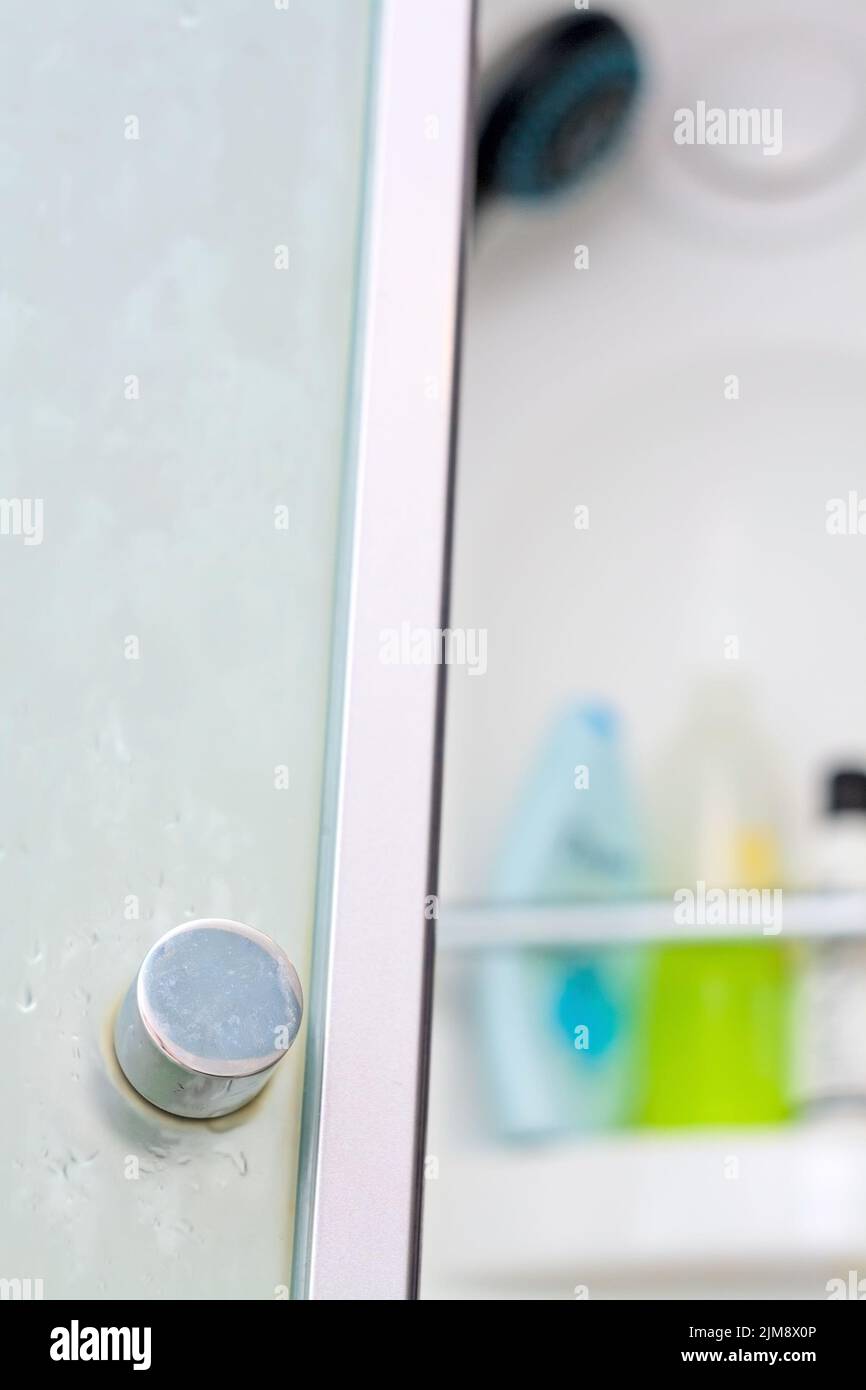 Open door of shower cubicle Stock Photo - Alamy