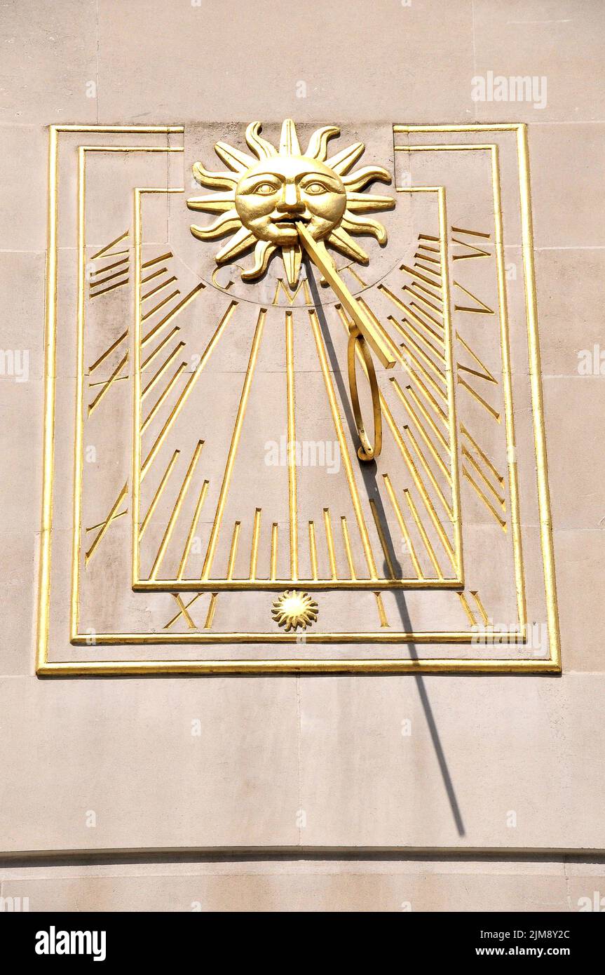 Golden sun dial Stock Photo - Alamy