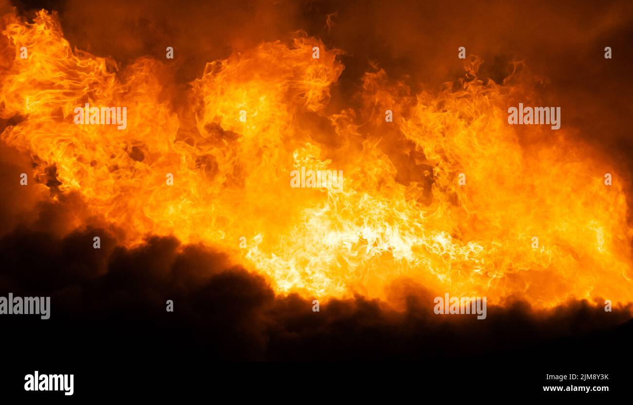 Burning fire flame on wooden house roof Stock Photo - Alamy