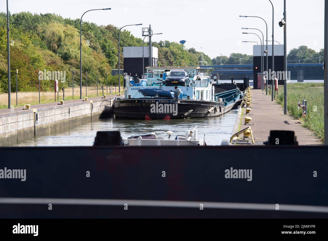 The cargo ship Helena Tineke loaded with coal is locked uphill in the ...