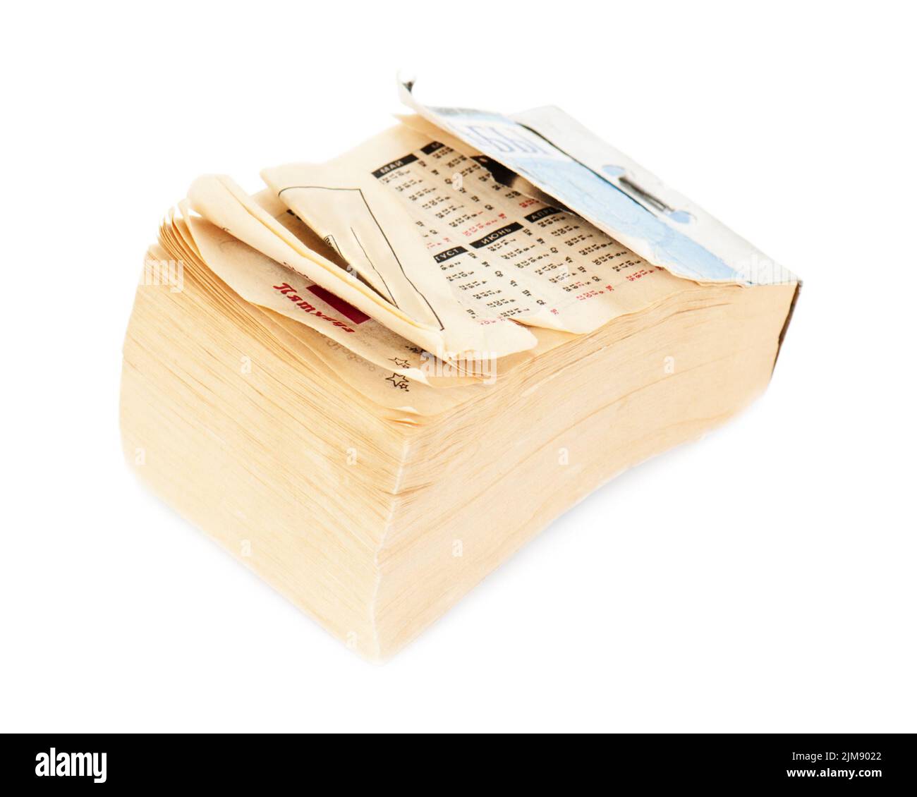 Old paper calendar isolated on white background Stock Photo - Alamy