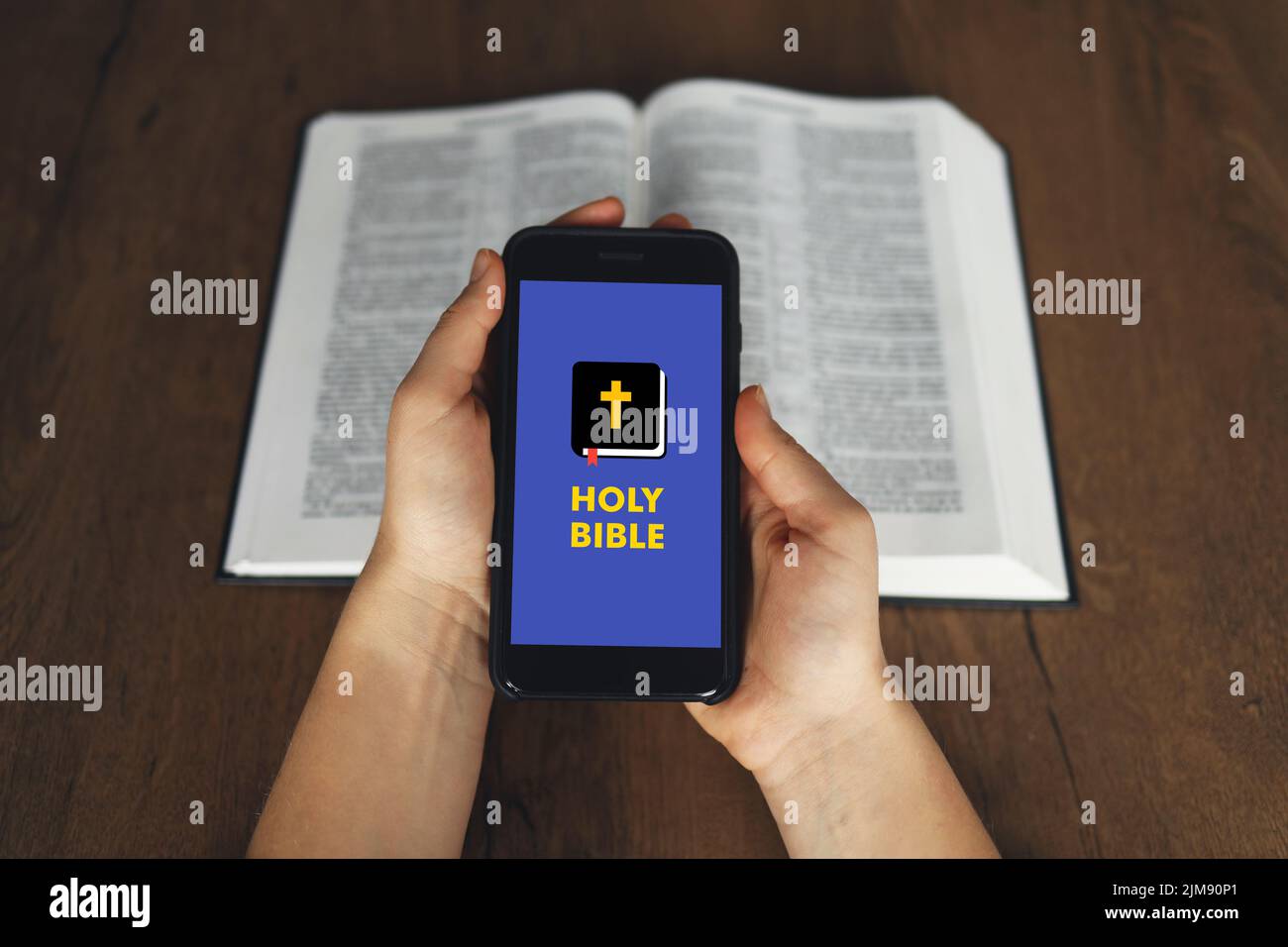 Woman hand hold and touch screen smart phone,cellphone in church over ...