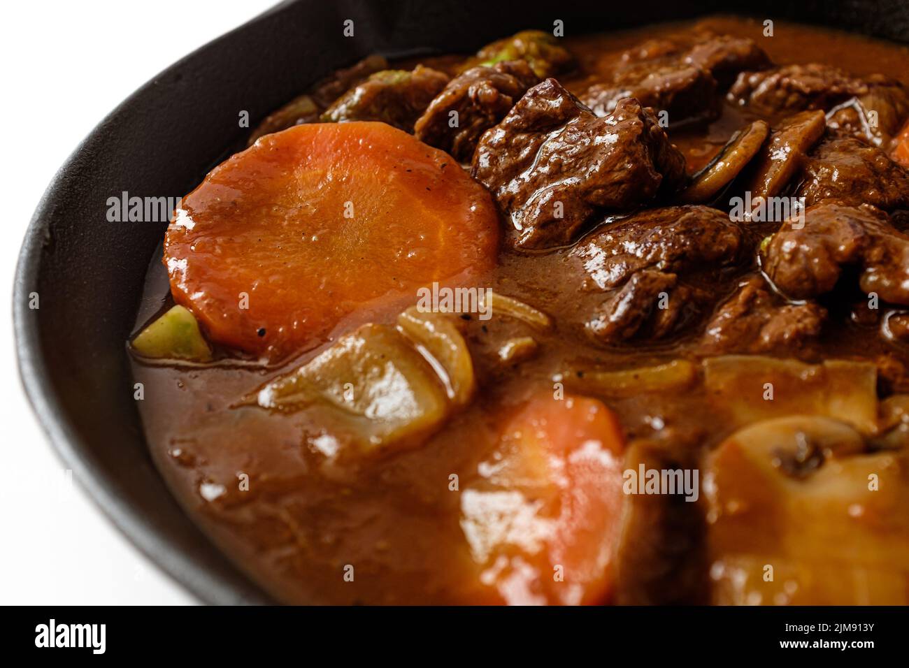 beef stew on a white background Stock Photo - Alamy