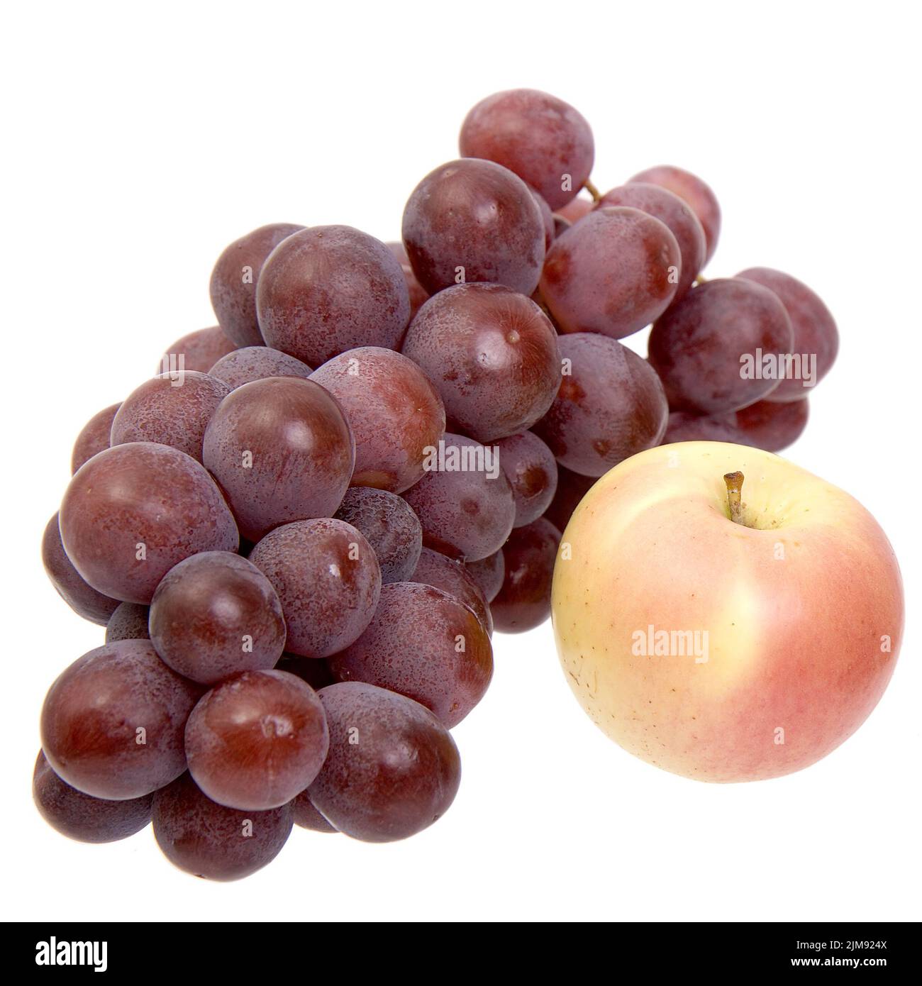 Apple and grapes on a white background Stock Photo - Alamy