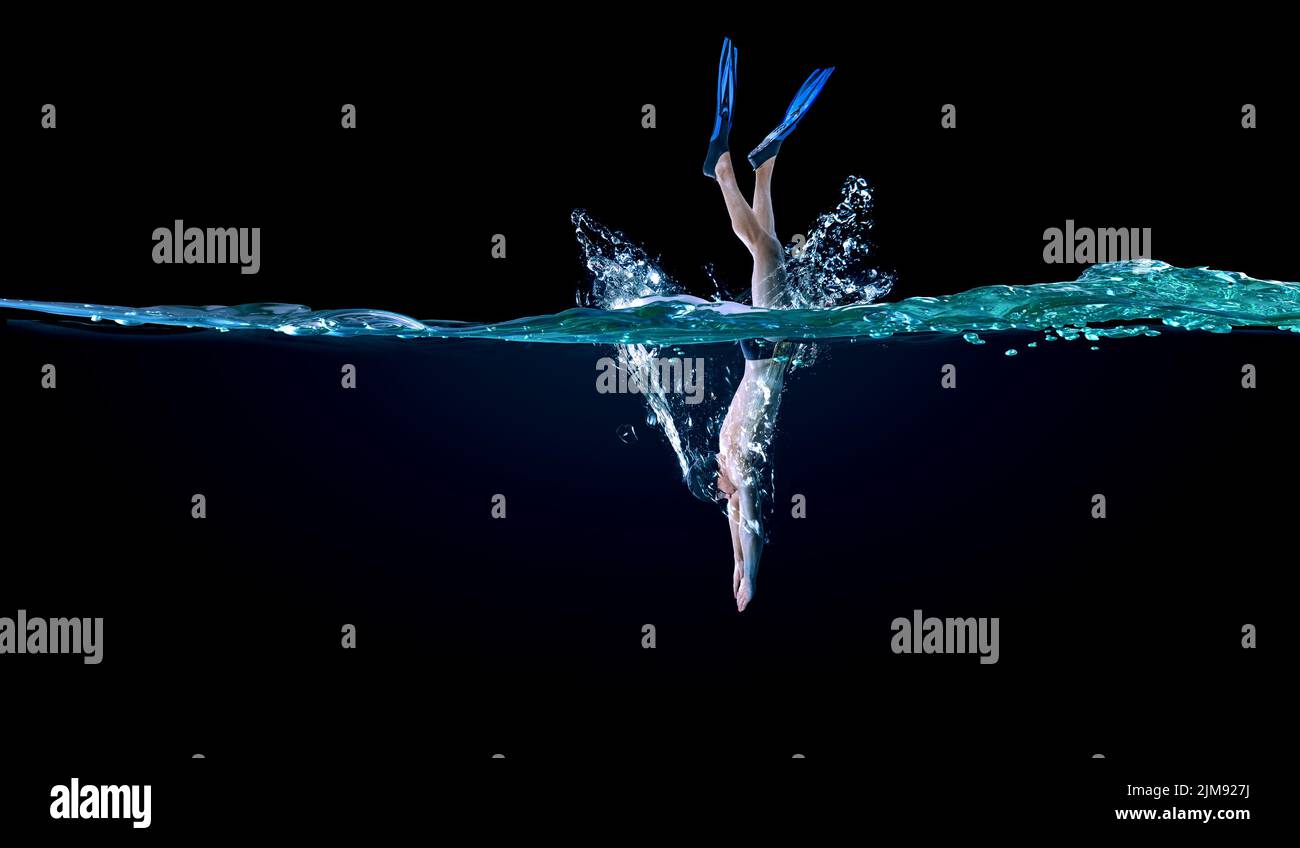 Professional man swimmer on a wave Stock Photo - Alamy