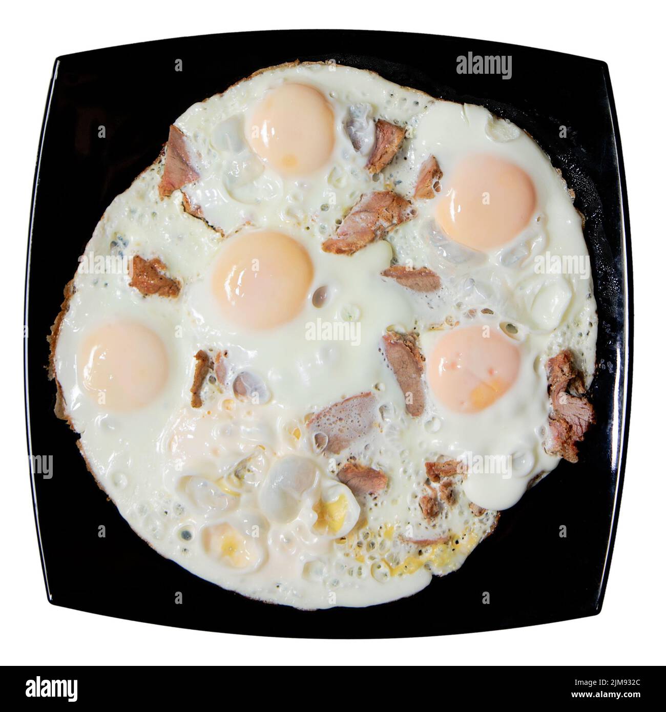 Fried eggs with meat Stock Photo - Alamy