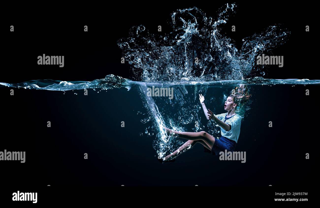 Woman underwater dive falling hi-res stock photography and images - Alamy