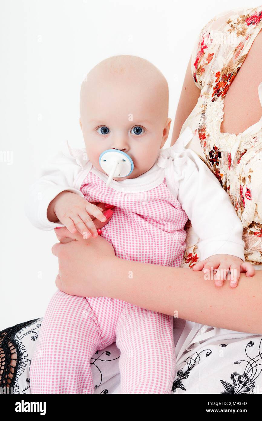 Pacifier baby girl hi-res stock photography and images - Alamy