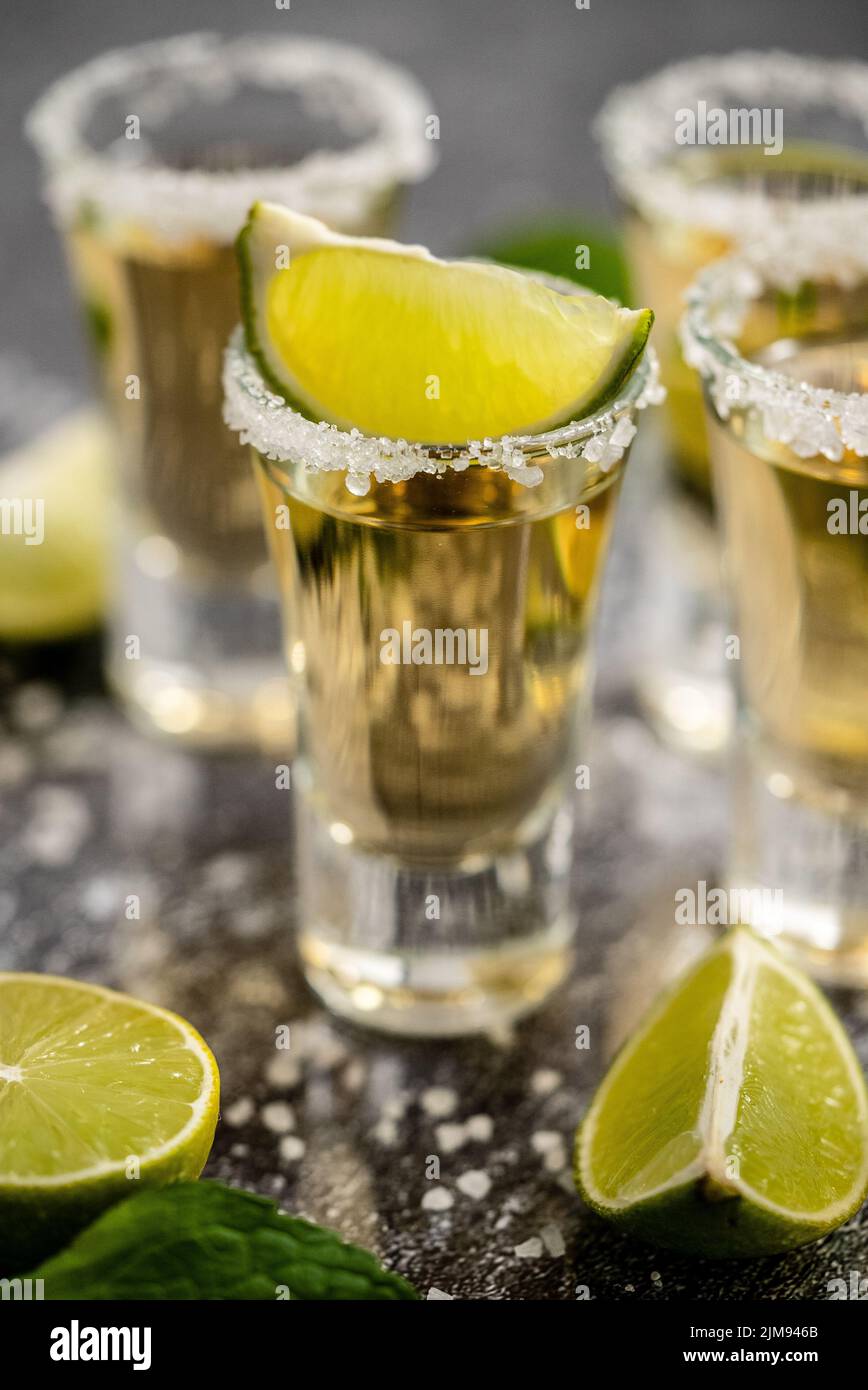 Gold tequila shot black background hi-res stock photography and images ...