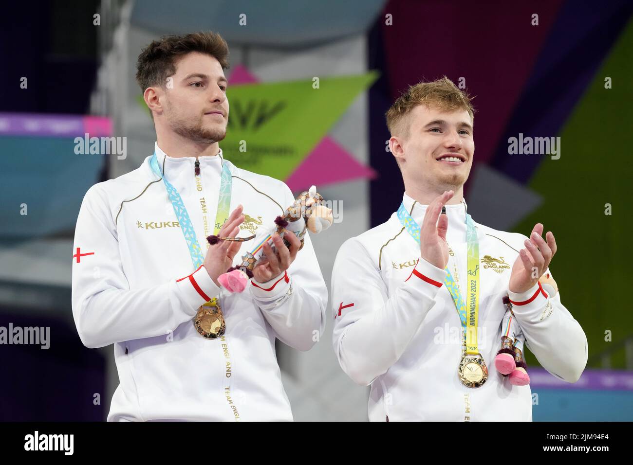 England's Anthony Harding and Jack Laugher with their Gold medals won ...