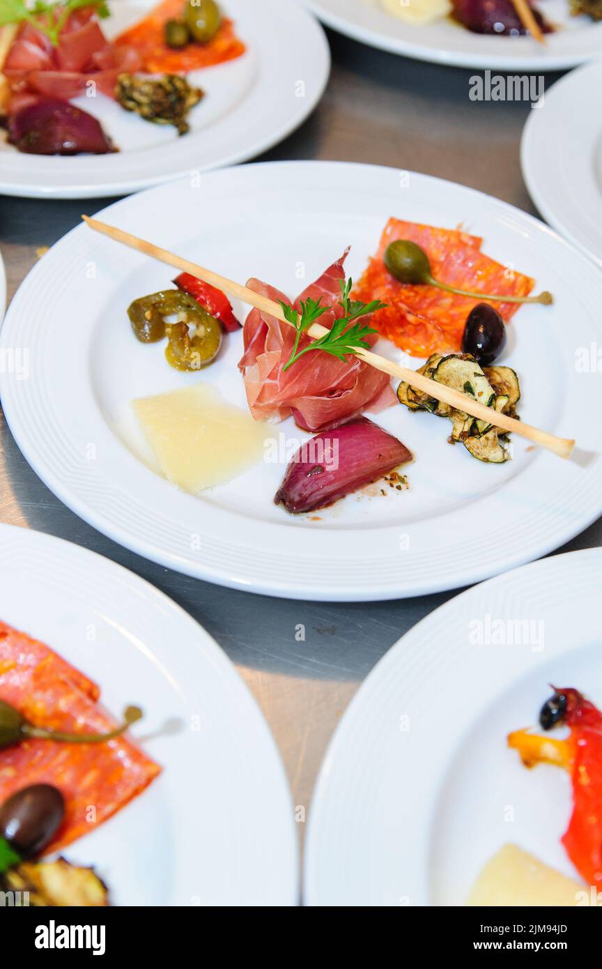 Buffet style food on plates Stock Photo - Alamy