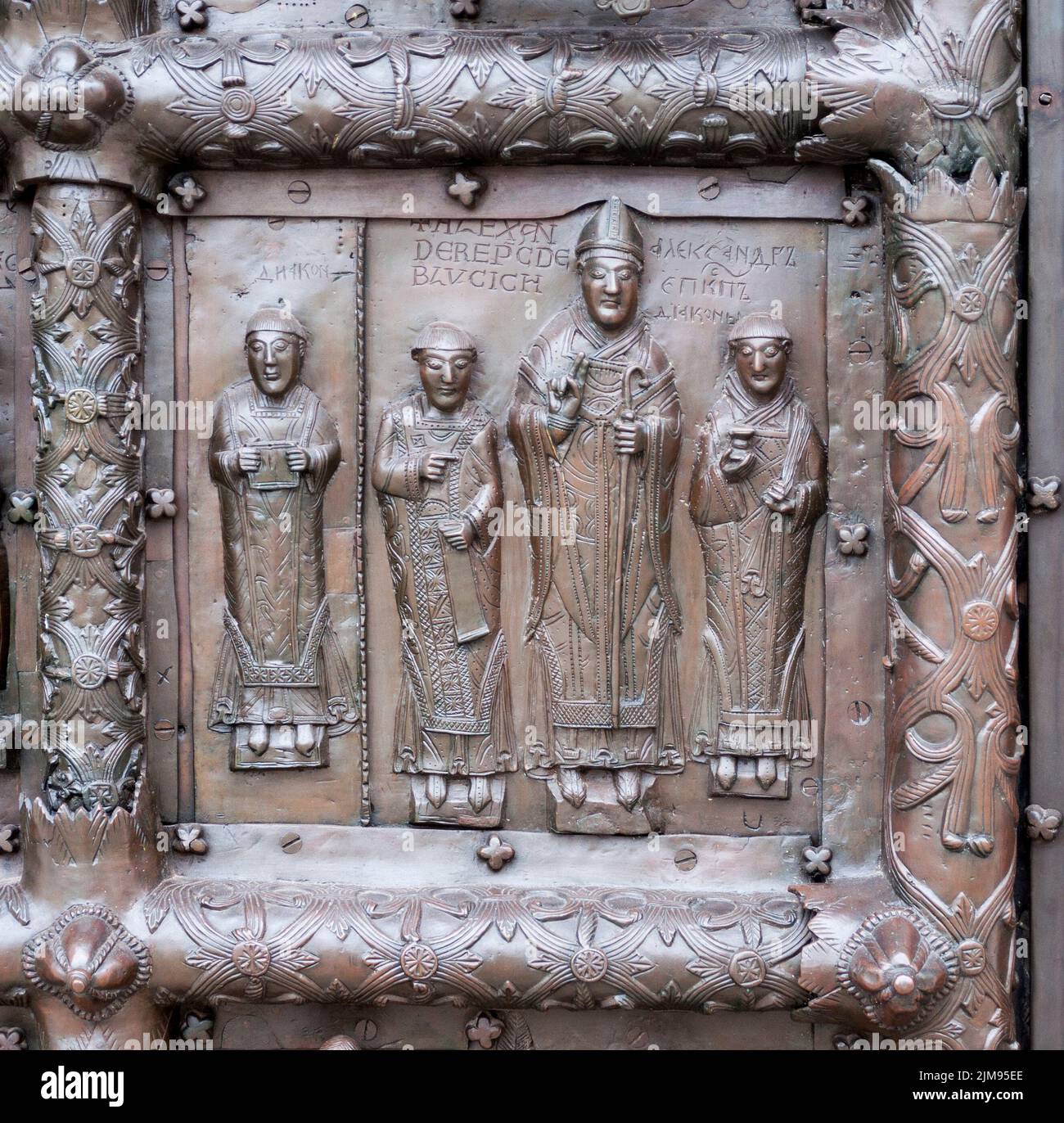 Bas-relief on ancient bronze gate in Veliky Novgorod Stock Photo - Alamy