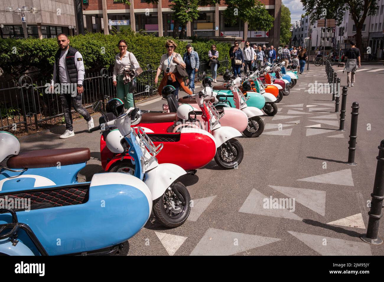 E-Vespina scooters with sidecars are available for rent for city tours ...
