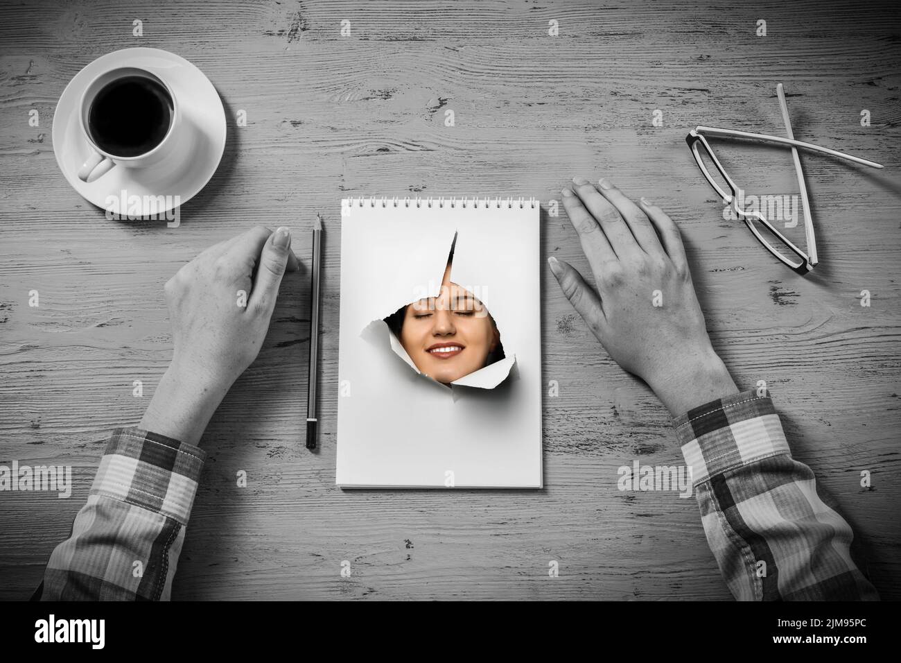 Female face through the hole in paper Stock Photo - Alamy