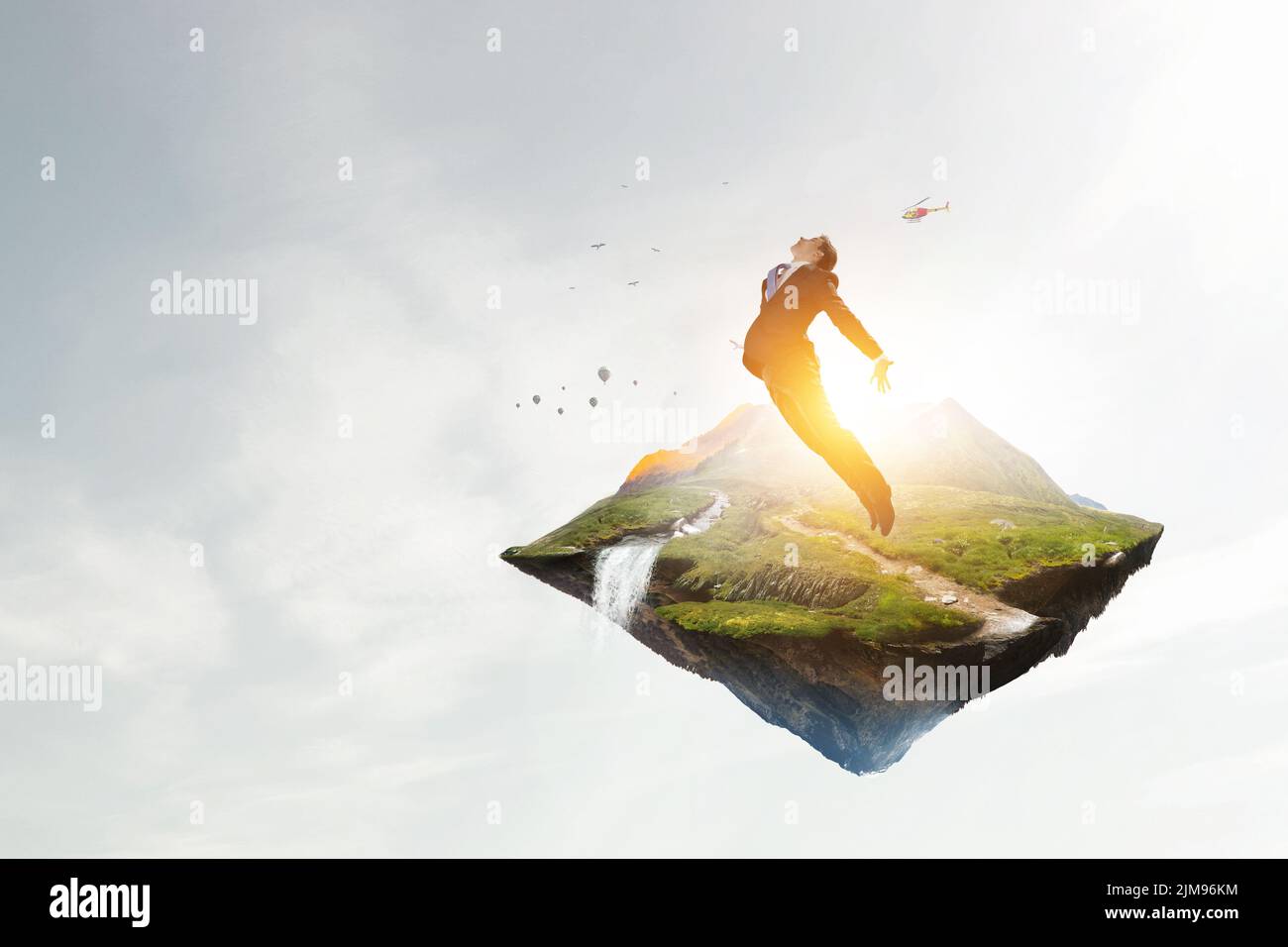 Business man flying paper hi-res stock photography and images - Alamy