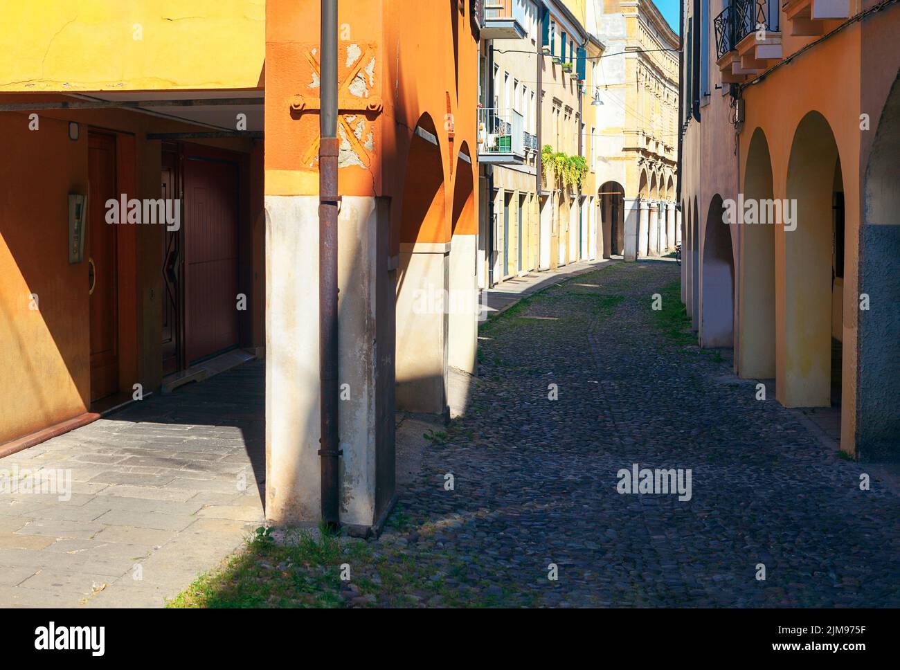 Traditional narrow street in Italian town . Pedestrian street with ...