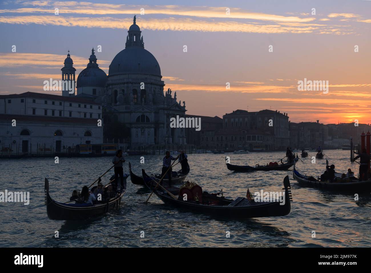 Gondolas in the Grand Channel near Basilica Santa Maria della Salute ...