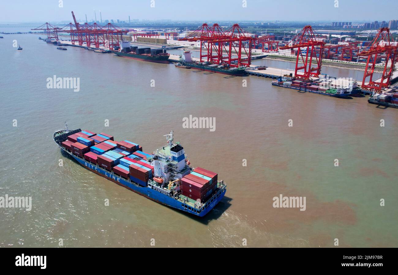 TAICANG, CHINA - AUGUST 5, 2022 - A cargo ship loaded with containers ...