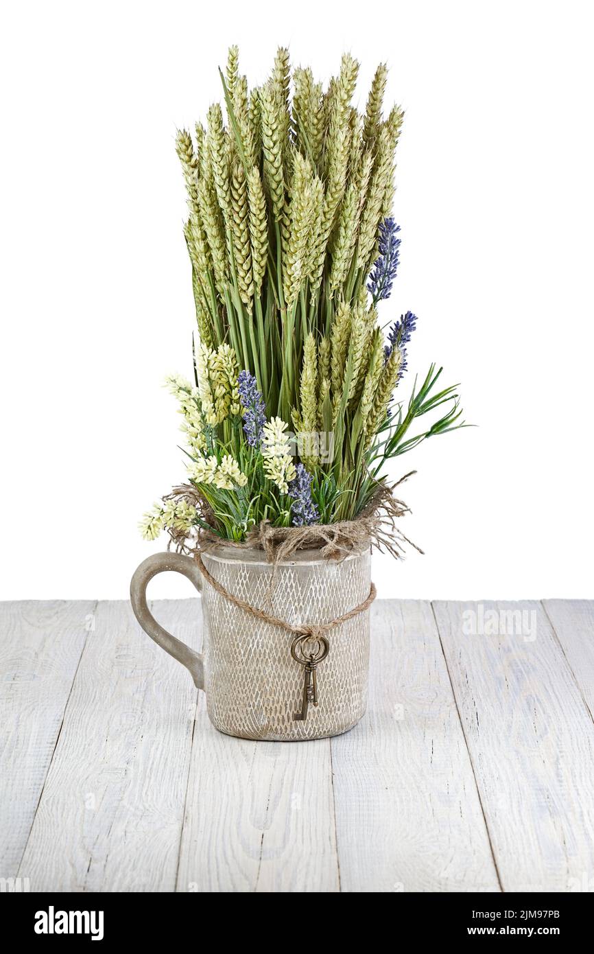 Still life of flowers and ears of rye in vintage vase with keys Stock ...