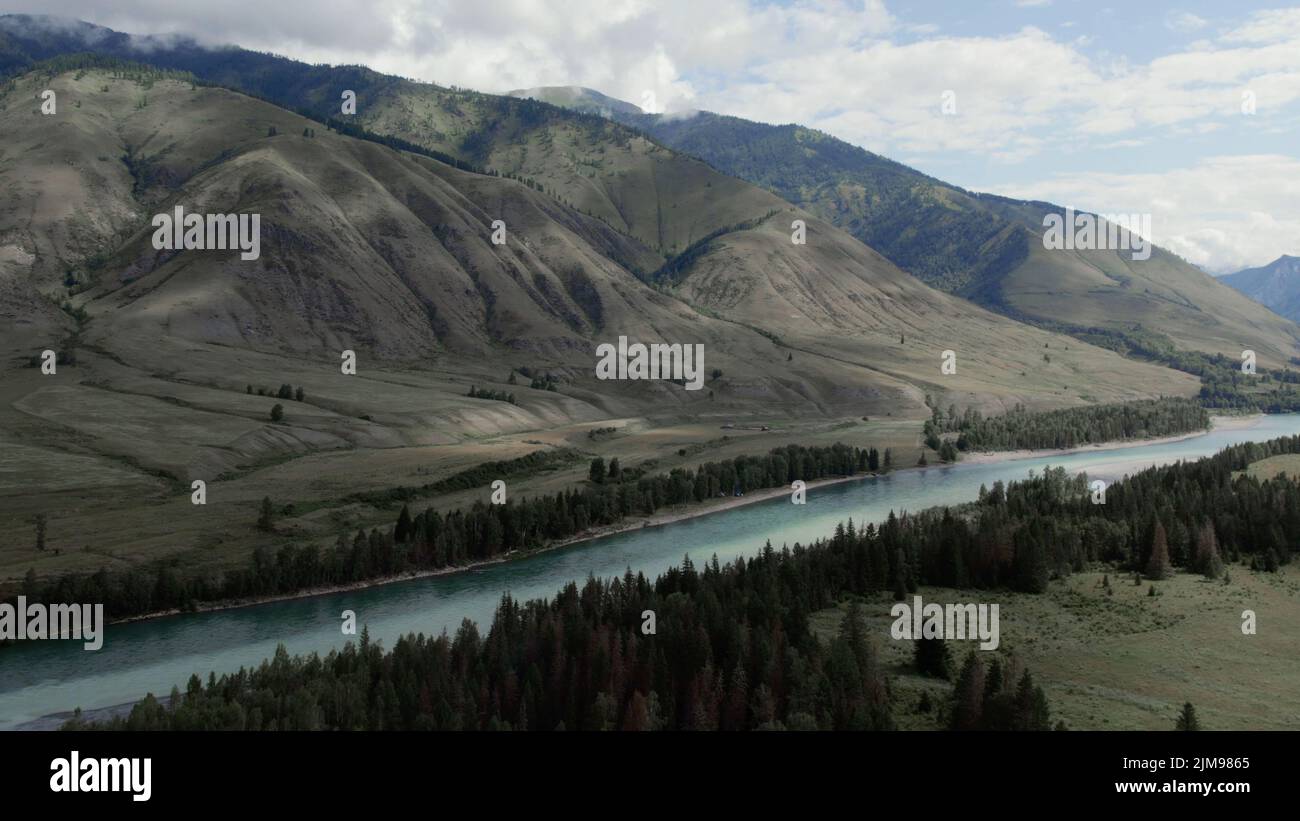 Blue Katun river in the middle of mountains of Ak-Kem valley in Altai ...