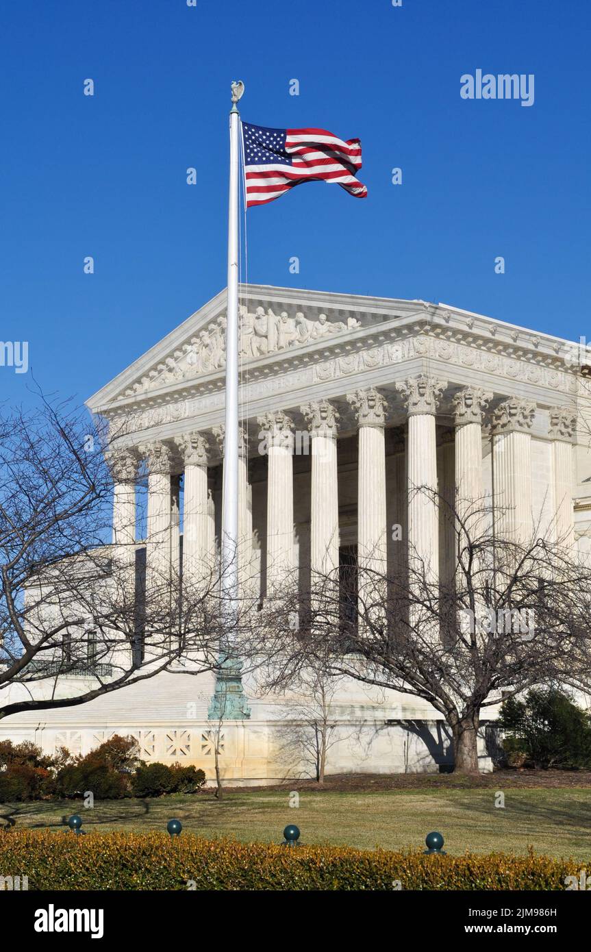 US Supreme Court Building with United States Flag Stock Photo - Alamy