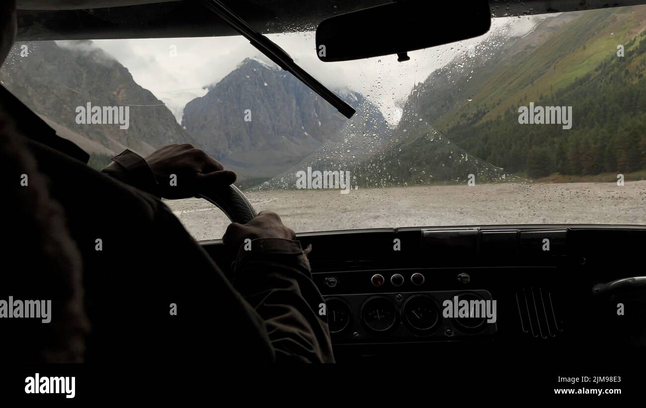 Looking through window of car to mountains of Aktru valley in Altai ...