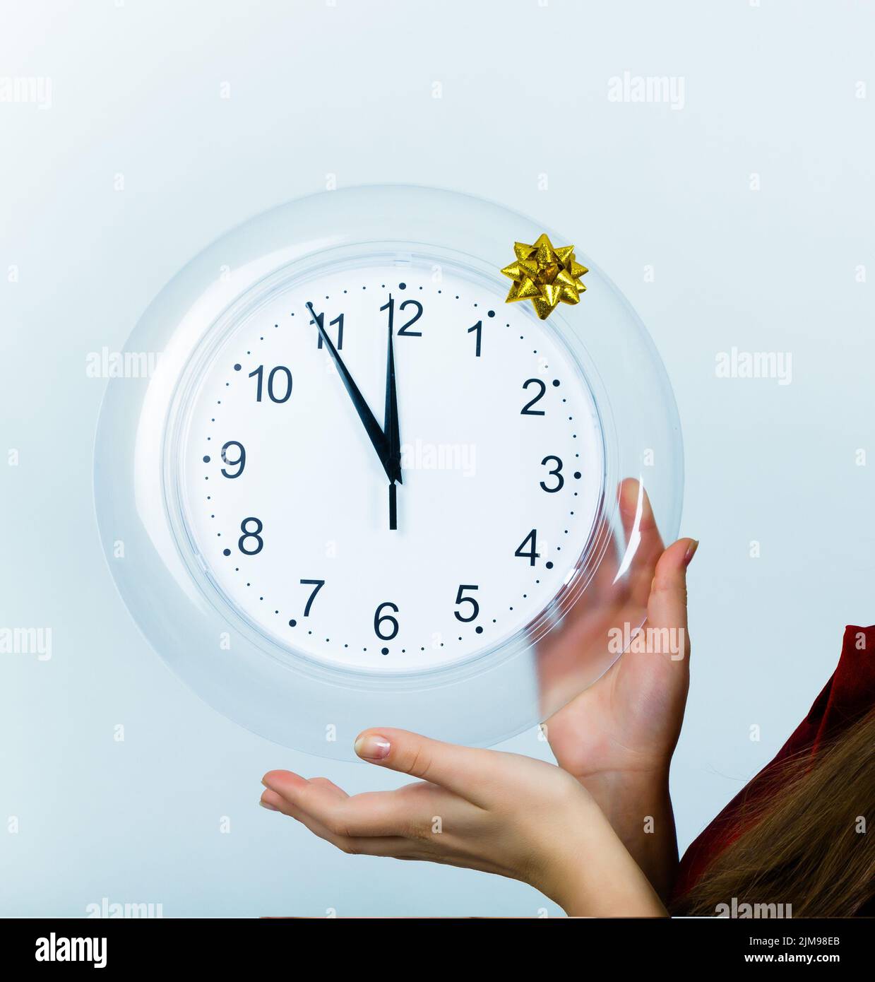 Clock showing midnight Stock Photo - Alamy