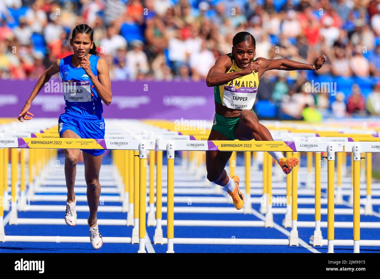 Megan Tapper of Jamaica on her way to winning the heat of the women’s ...