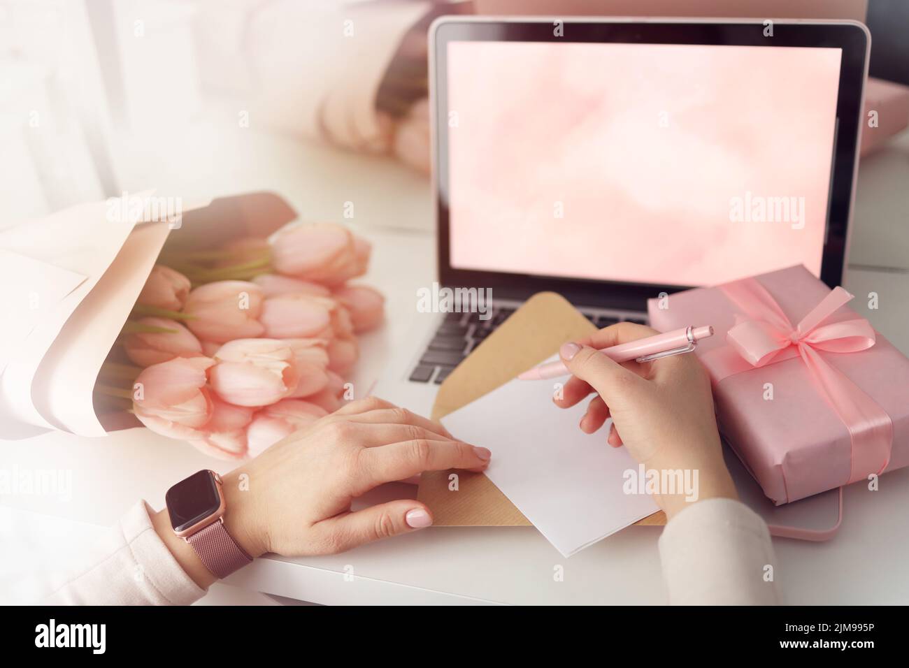 Female hands writing down wishes on latter paper for Valentines or ...