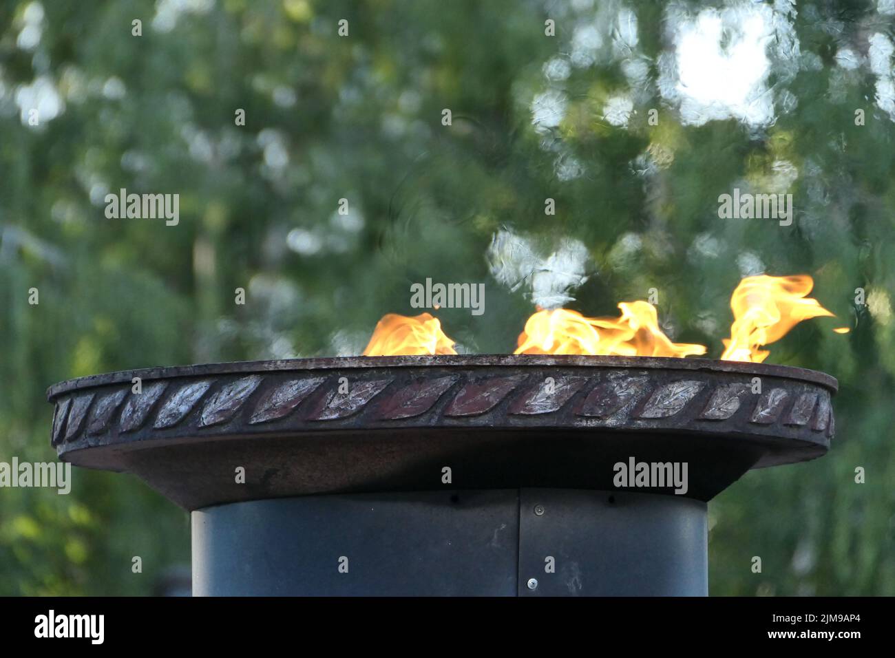 Eternal flame, constantly burning fire, a symbol of memory Stock Photo ...