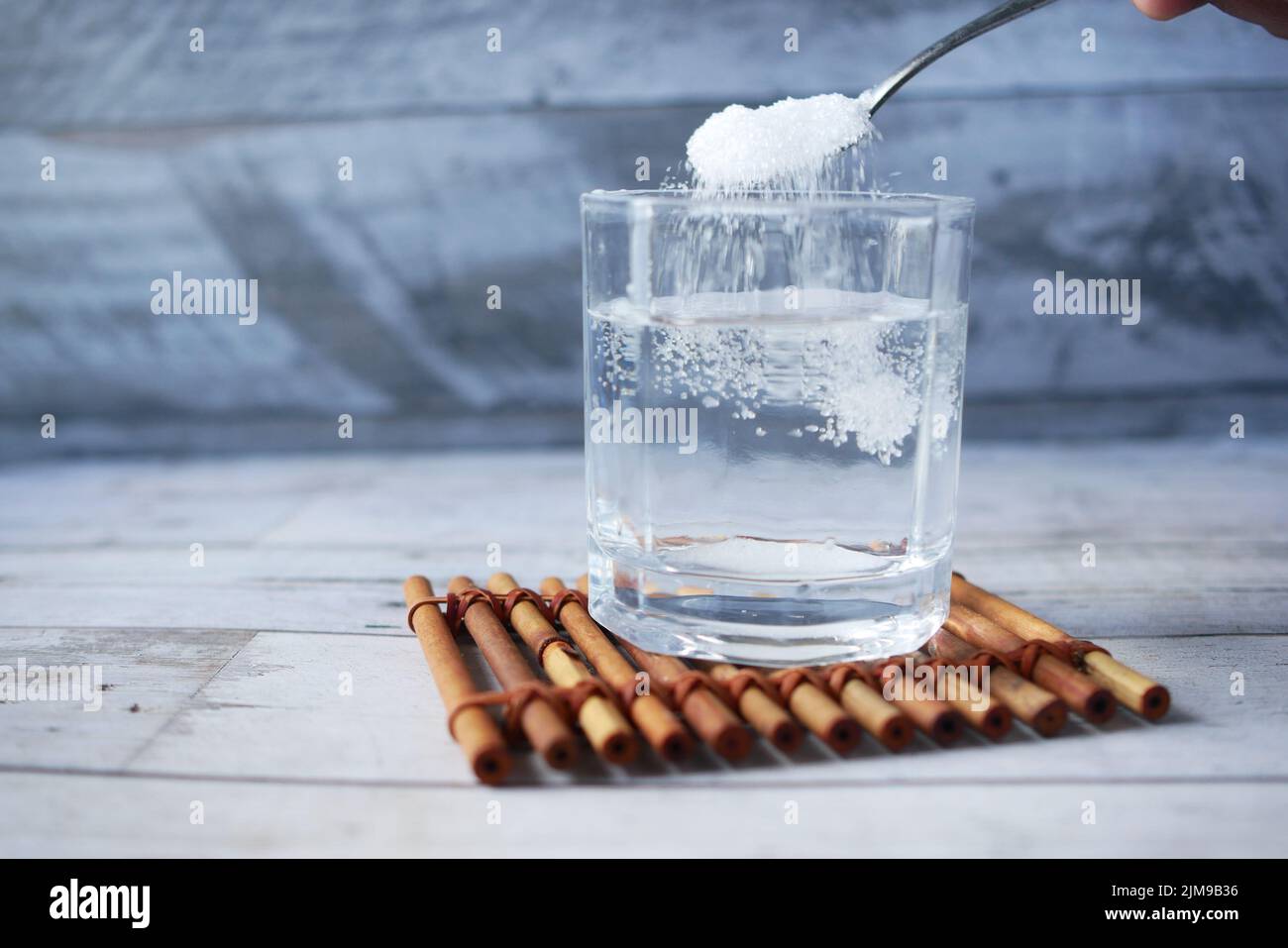 Sugar pouring in water hi-res stock photography and images - Alamy