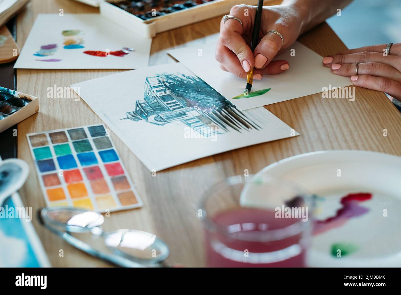 watercolor painting artist work color brushstrokes Stock Photo - Alamy
