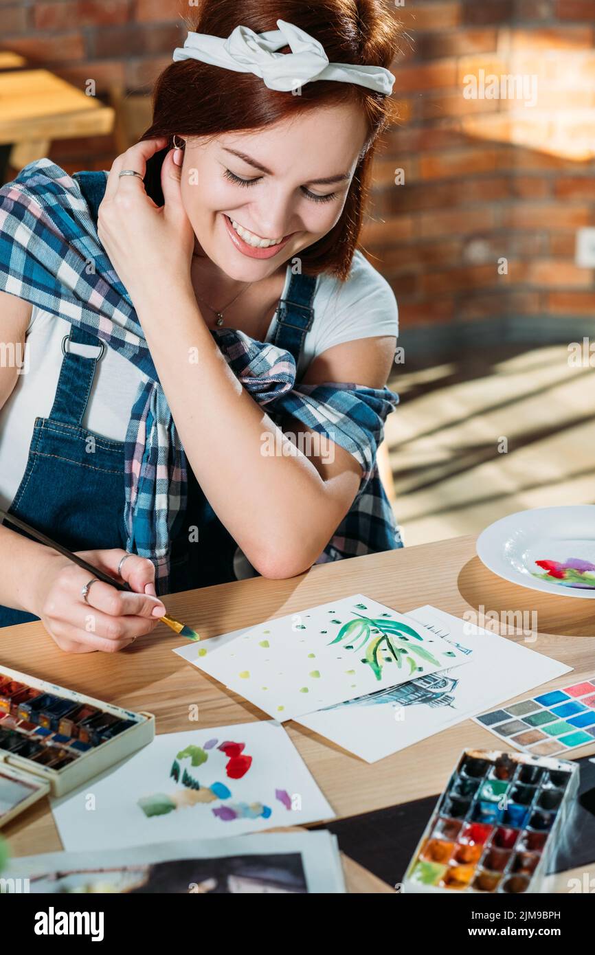 studio workplace woman painting hobby palette Stock Photo - Alamy