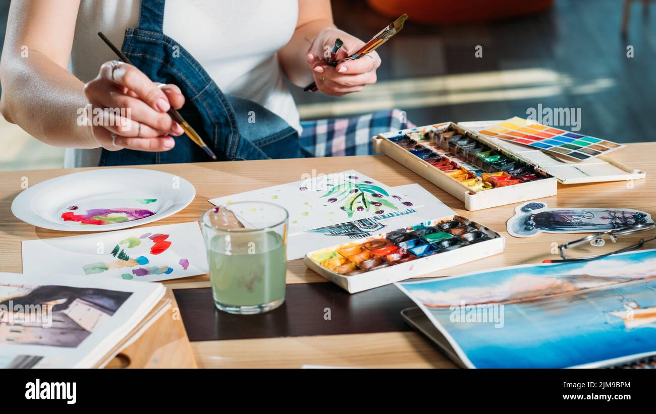 studio workplace woman painting hobby palette Stock Photo - Alamy
