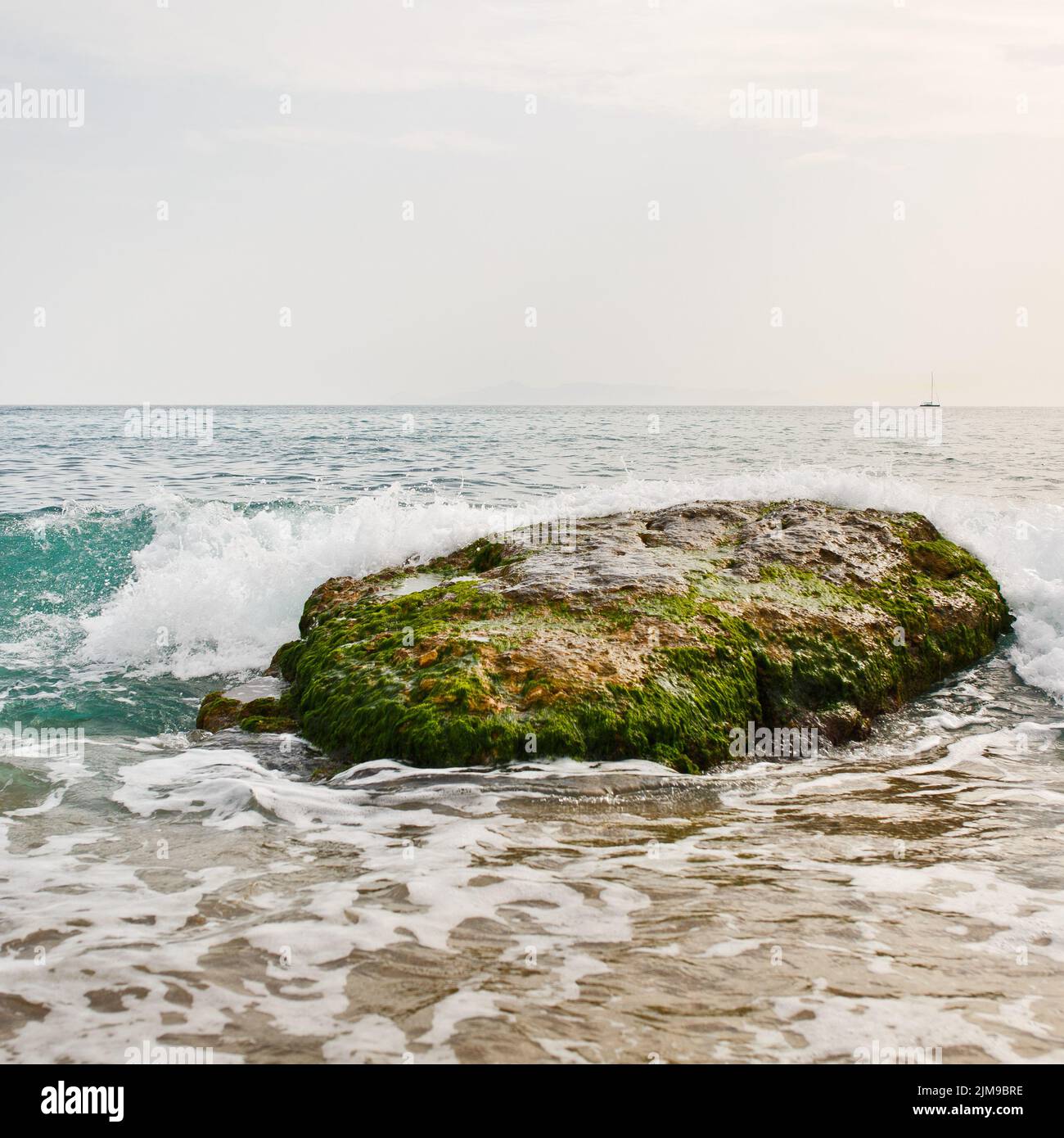 Rock in the sea Stock Photo - Alamy