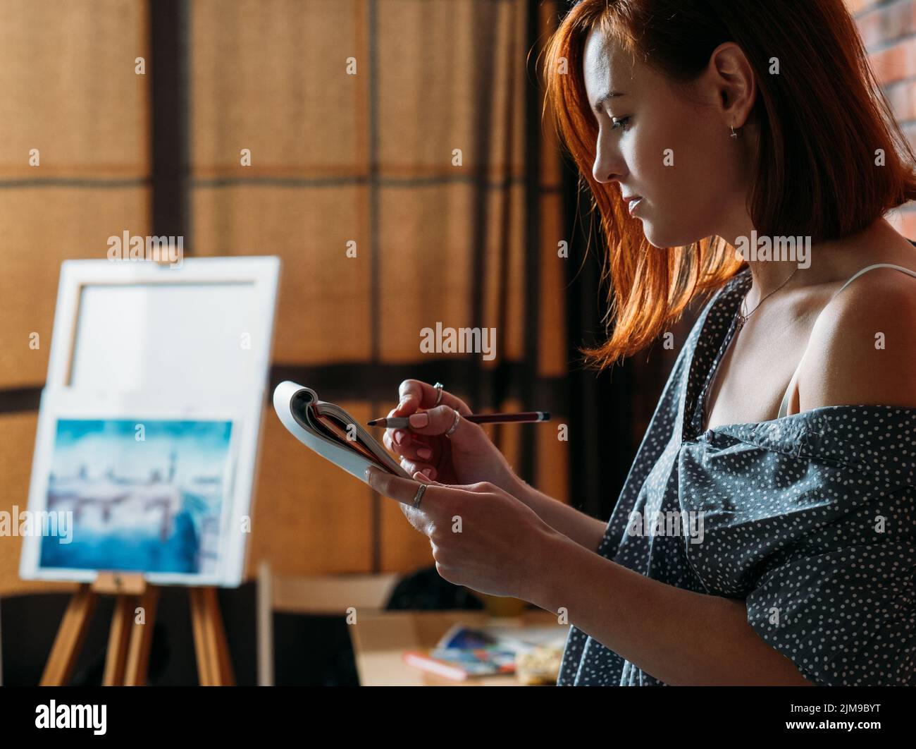 artist sketching studio workspace painter pencil Stock Photo - Alamy