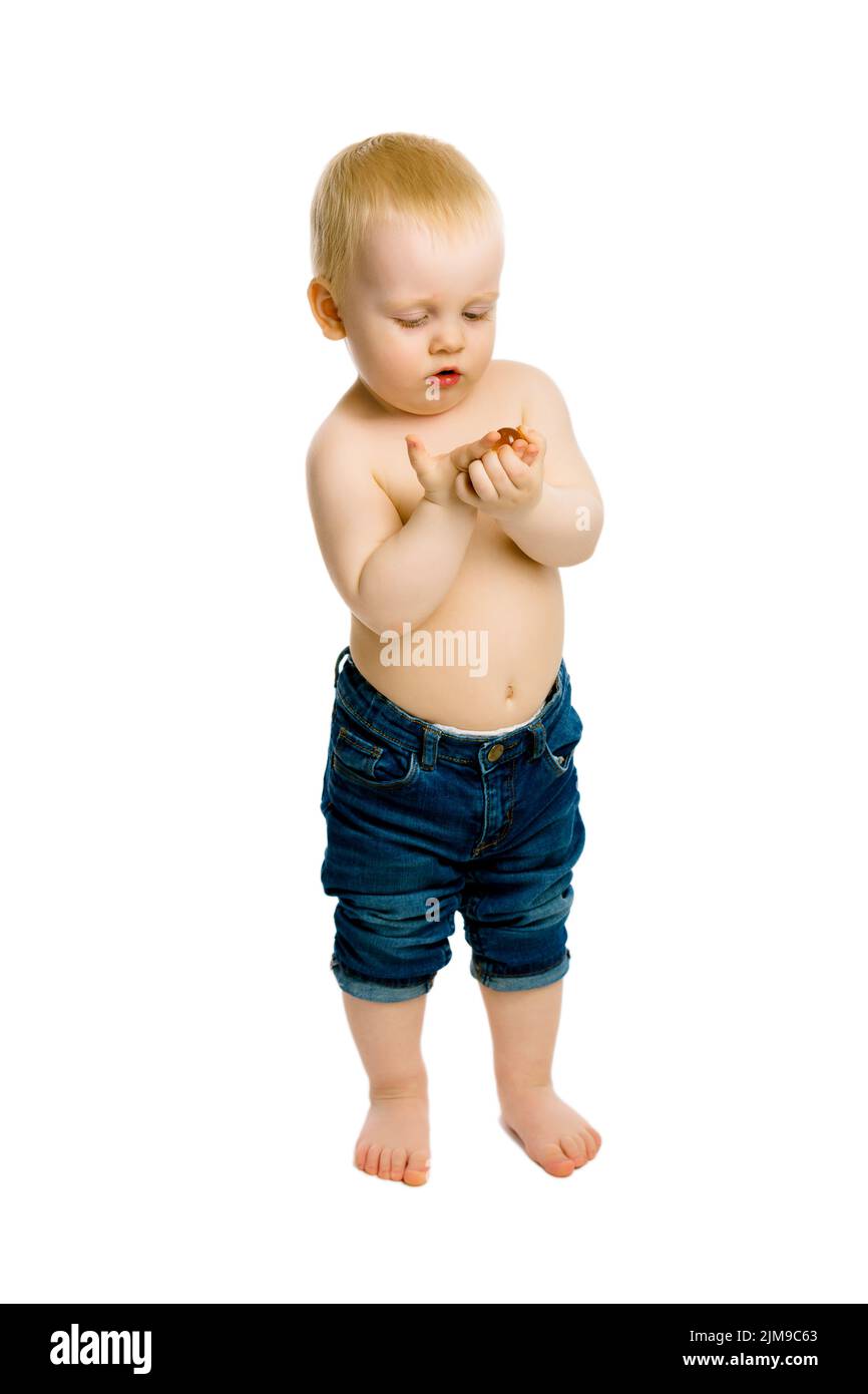 Curious baby boy. Full length. Studio. isolated Stock Photo - Alamy