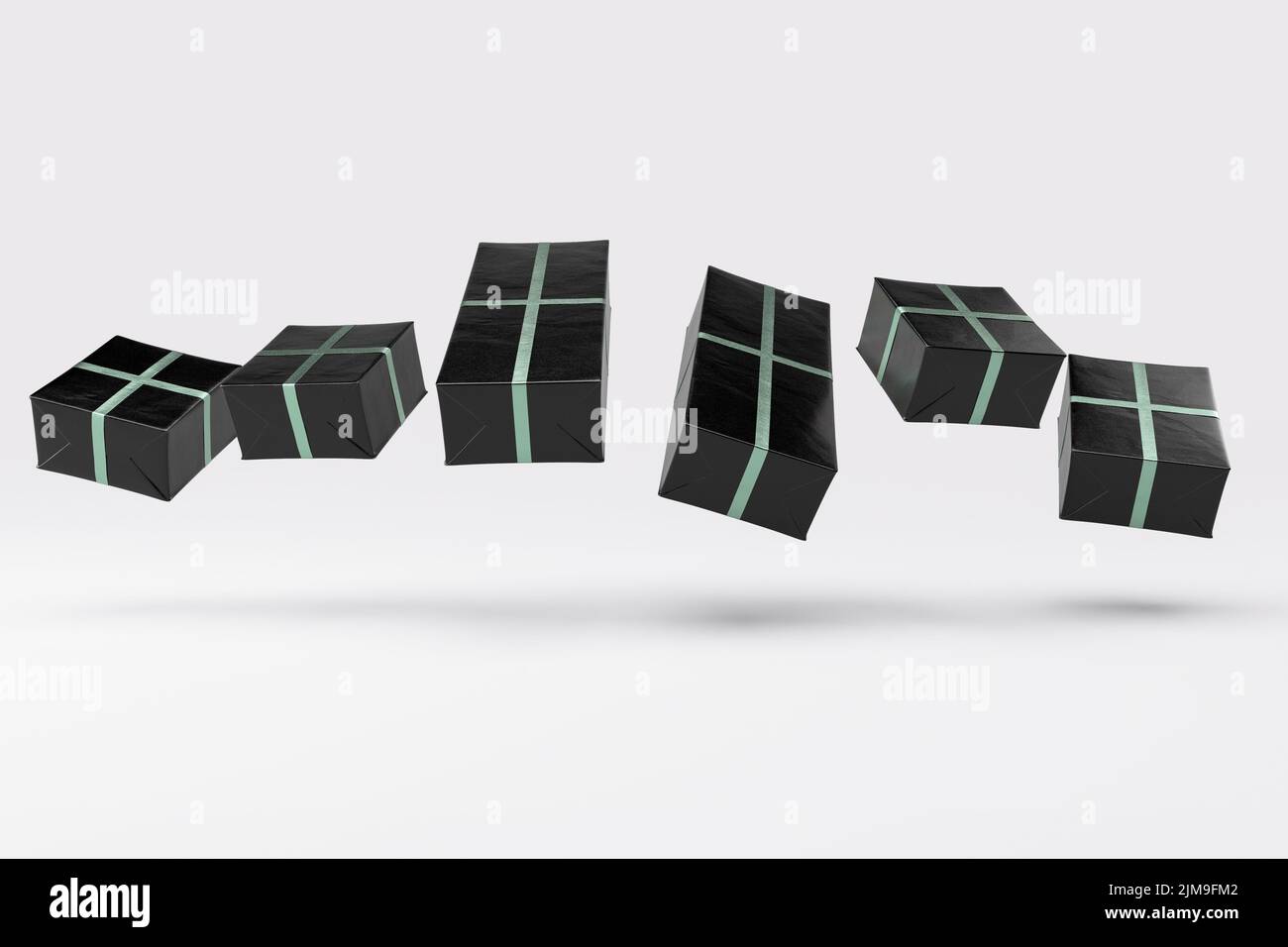 A floating collection of different sized rectangular gift boxes wrapped ...