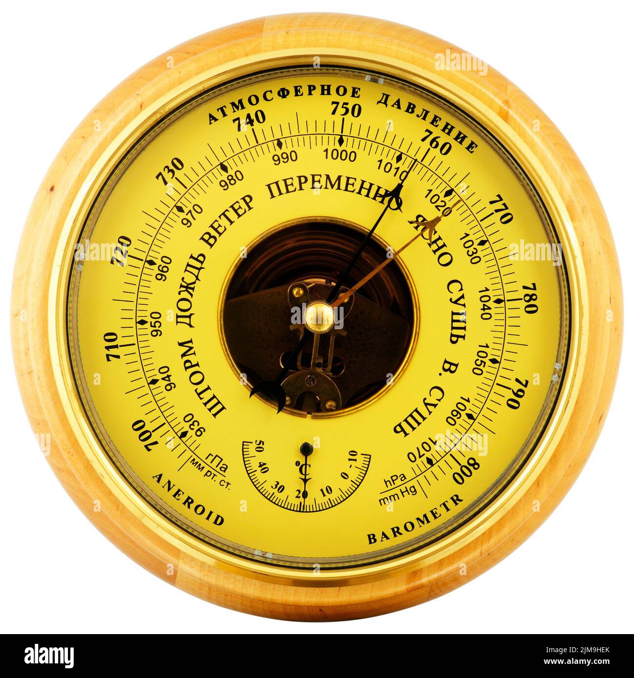 Aneroid barometer combined with thermometer device isolated on white ...